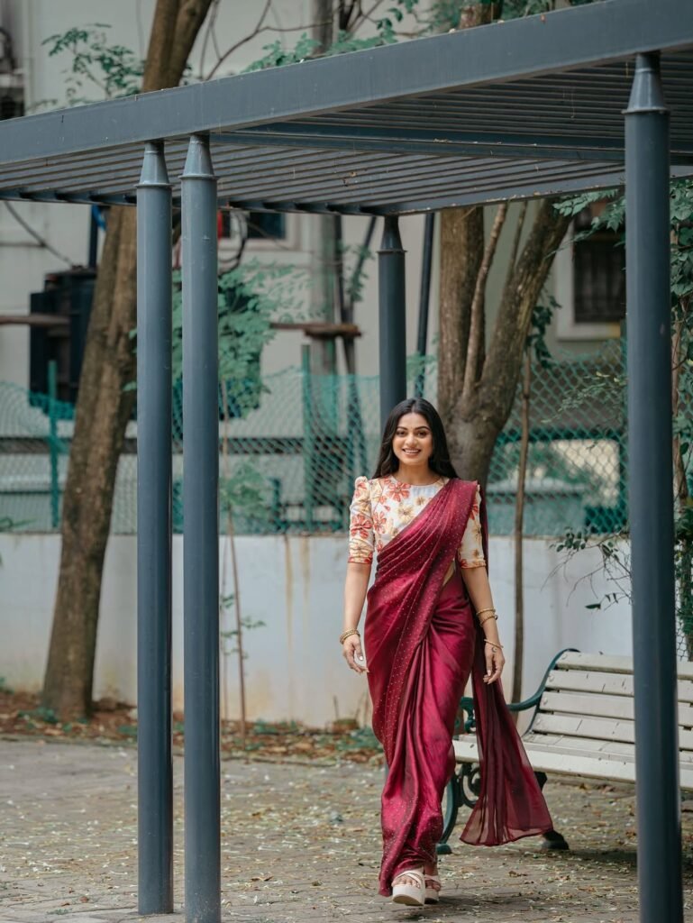 Delna Davis Elegant Maroon Saree Outdoor Photoshoot - ActorFacts